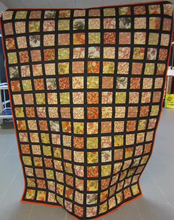 Firkanter i sort gitterværk - Projekt Puttetæpper